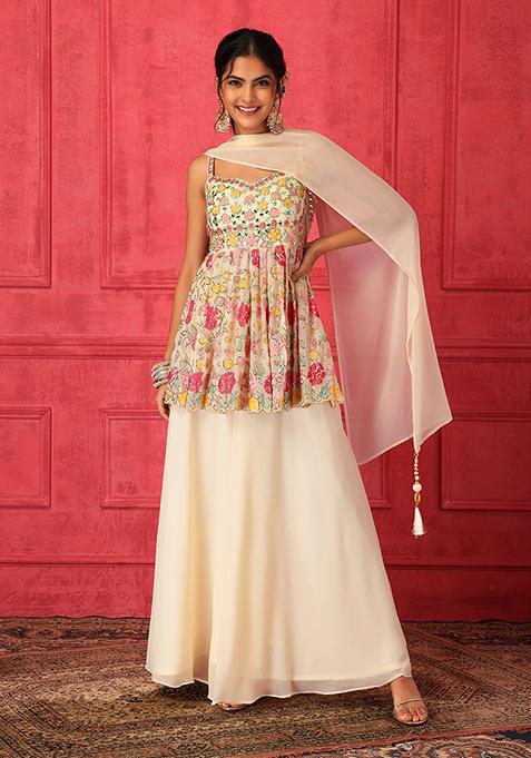 Buy Women Ivory Sharara Set With Short Embroidered Peplum Kurta And ...